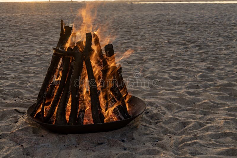Campfire on a Beach during Sunset Stock Photo - Image of evening, rock ...