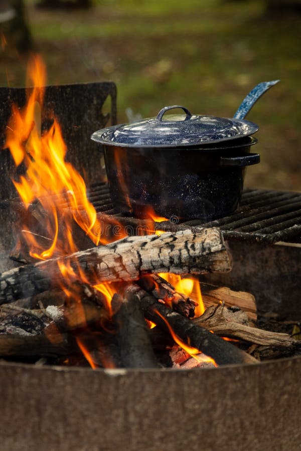 A Campfire with a Blue Pot Cooking Stock Image - Image of barbecue ...