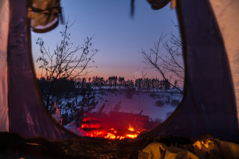 Campfire Burns in the Snow in the Forest Hill, on a Background of Snow ...