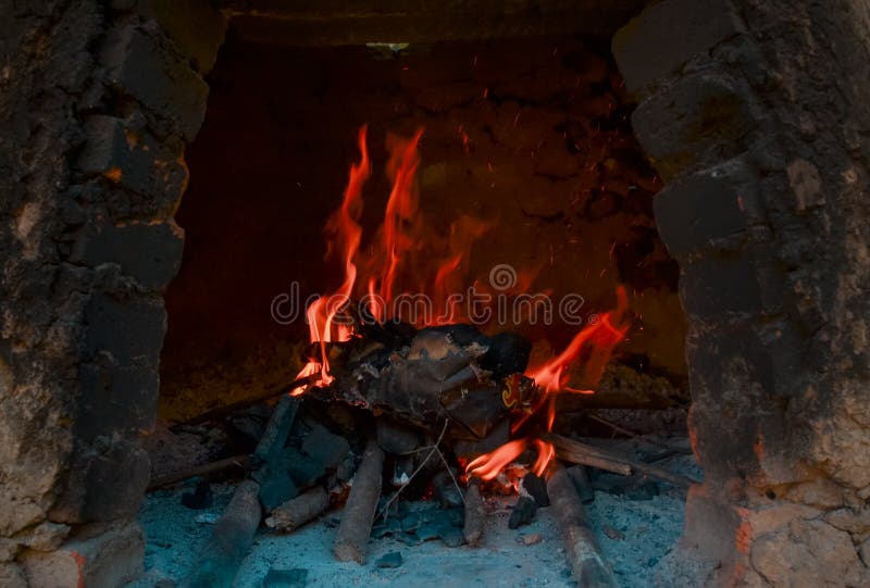 Fire for Cooking in Clay Oven Stock Photo - Image of cooking, flowers ...