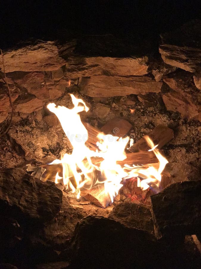 Fun around the fire stock image. Image of home, fire - 105361501
