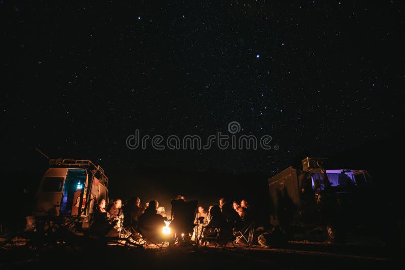 Campfire with Lots of People and Camper Van at Night Editorial Image ...