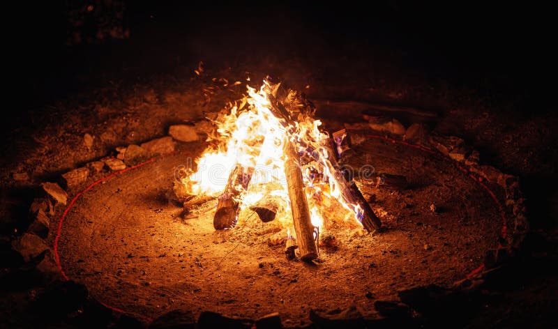Campfire at Night within a Stone Circle. Stock Image - Image of fire ...
