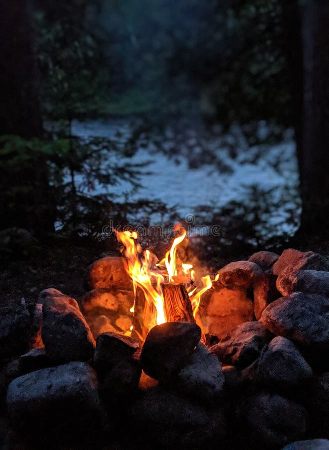 Campfire by the river stock photo. Image of light, wild - 164022108