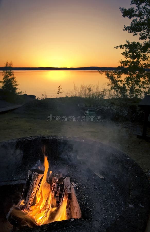 Campfire at the sunset stock photo. Image of tranquil - 30799432