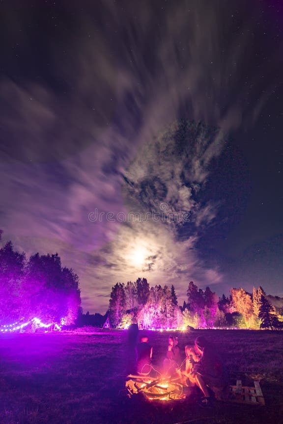 Campfire Under Moonlight at Festival Stock Photo - Image of middle ...