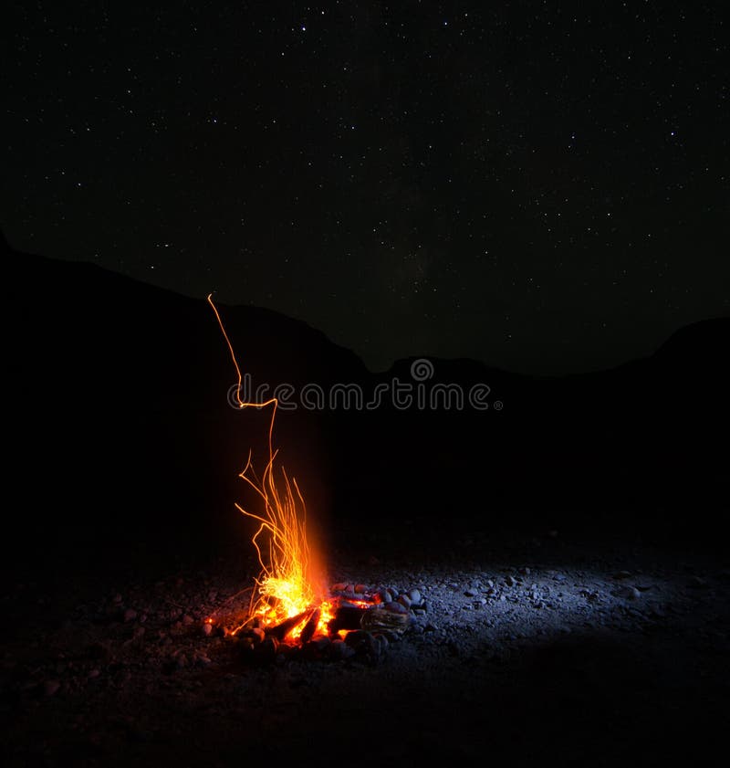 Campfire under the stars stock photo. Image of nature - 96343642