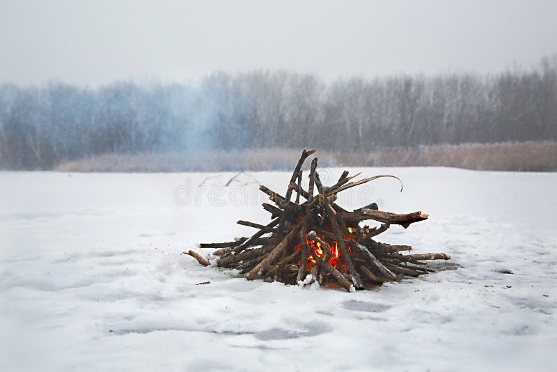 Campfire in winter stock photo. Image of frozen, broil - 81867250
