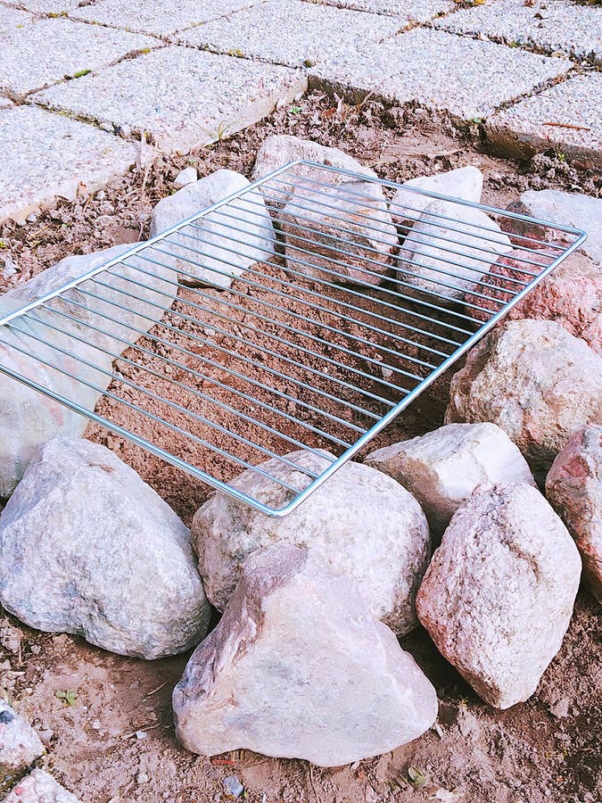 Camping BBQ made of stone stock photo. Image of fire - 94083862