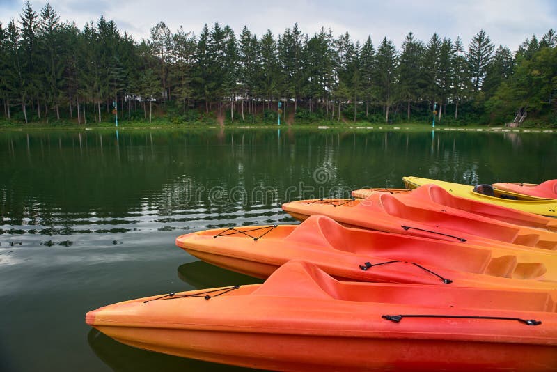 Camping on the Beach. Kayak on the Beach by the Lake Stock Photo ...