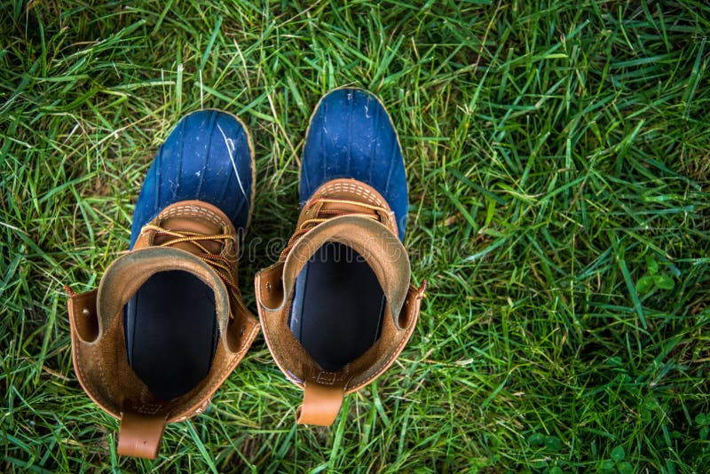 Camping boots in the grass stock image. Image of lace - 93474233