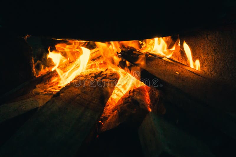 Firewood Burns Inside the Fireplace with Fire and Smoke Stock Image ...