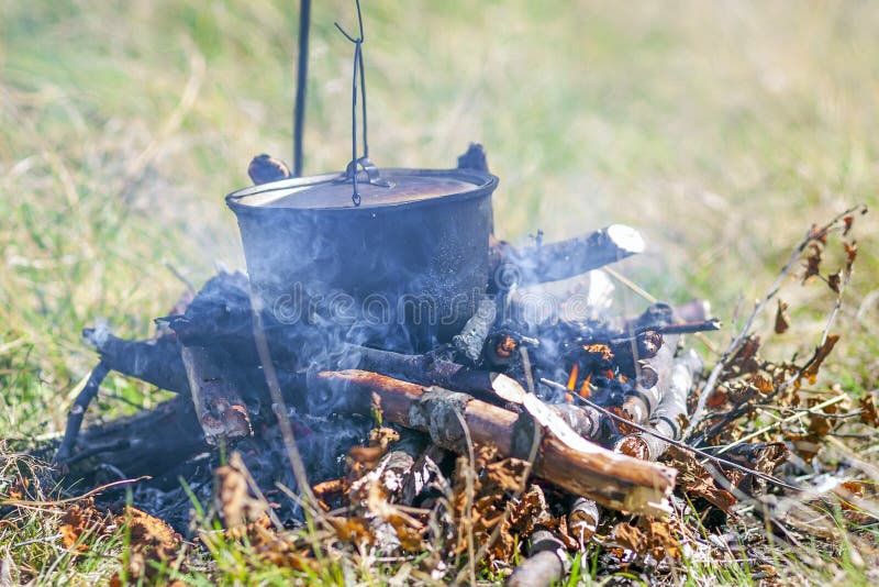 Camping Kitchenware - Pot on the Fire at an Outdoor Campsite Stock ...