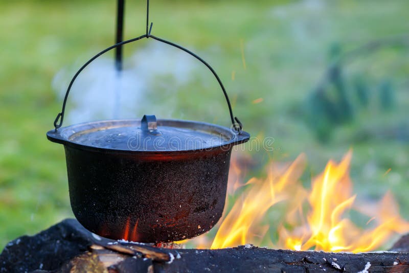 Camping Kitchenware - Pot on the Fire at an Outdoor Campsite Stock ...