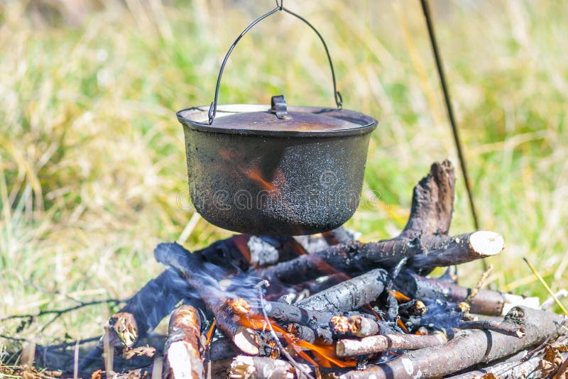 Camping Kitchenware - Pot on the Fire at an Outdoor Campsite Stock ...