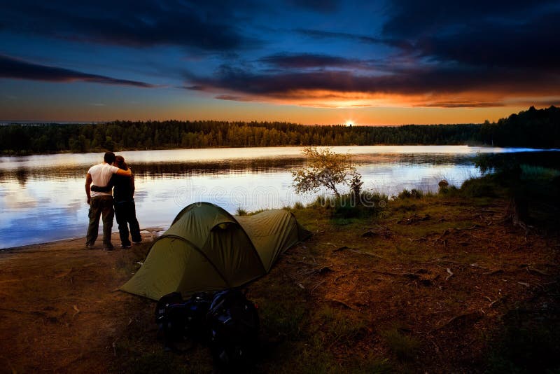 Night Summer Camping on Shore. Group of Young Tourists Around Campfire ...