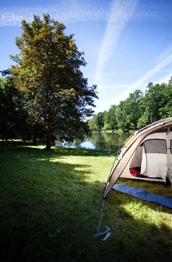 Camping by the lake stock image. Image of forest, happiness - 42130397