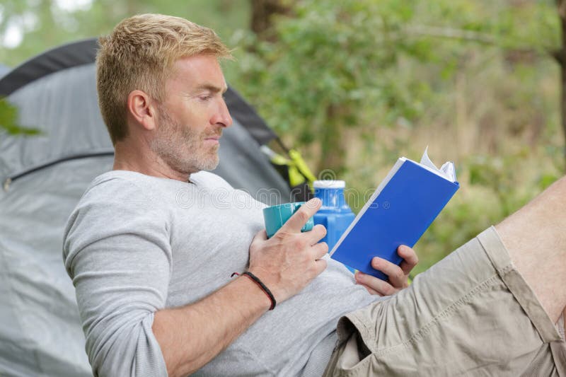Camping Man Reading Traveling Guild Book Stock Image - Image of camping ...