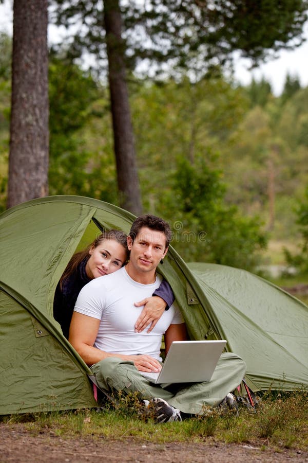 Camping with Laptop by Lake Stock Photo - Image of camping, nature ...