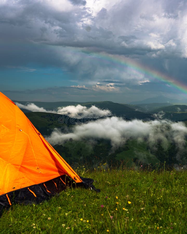 Camping in the Mountains with Tent Standing on a Hill, Night and Sunset ...