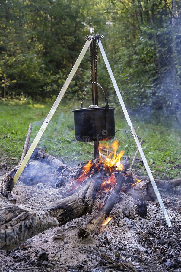 Camping pot on a campfire stock image. Image of cauldron - 241694369
