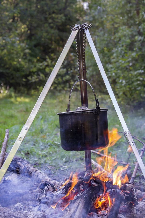Camping pot on a campfire stock image. Image of cauldron - 242731625