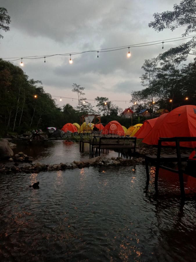 Camping beside the River stock photo. Image of riverside - 266176662