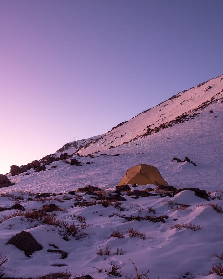 Camping in the Snow with Purple Sky Stock Photo - Image of night, snow ...