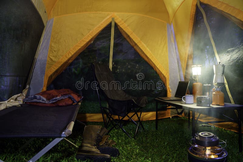 Camping Tent, Folding Bed Inside the Tent at Night in the Forest, Gas ...
