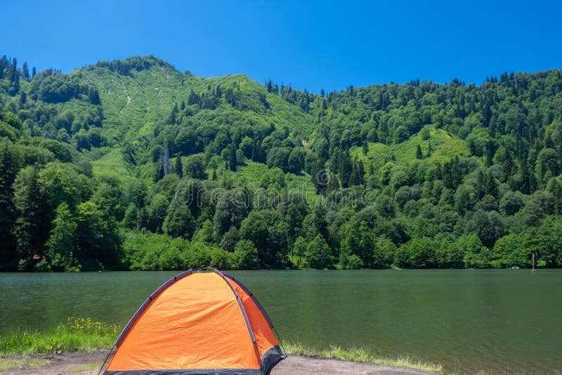 Camping Tent at Scenic Campsite on a Lake Stock Photo - Image of lake ...