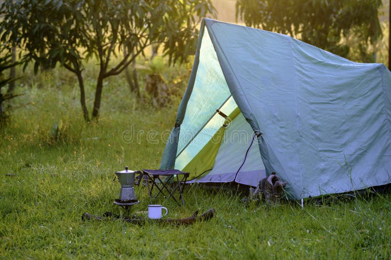 Camping Tents at Night with Outdoor Coffee-making Facilities in a ...