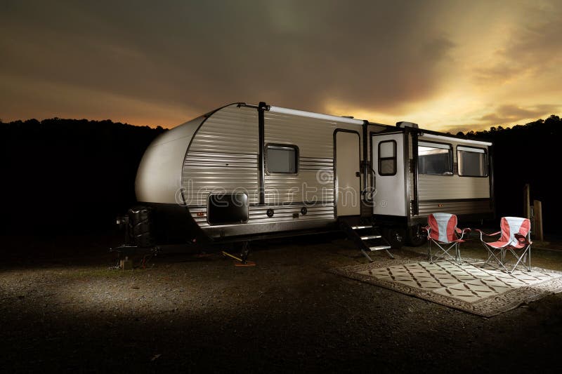Campsite with an RV and Bright Sunset Stock Photo - Image of metal ...