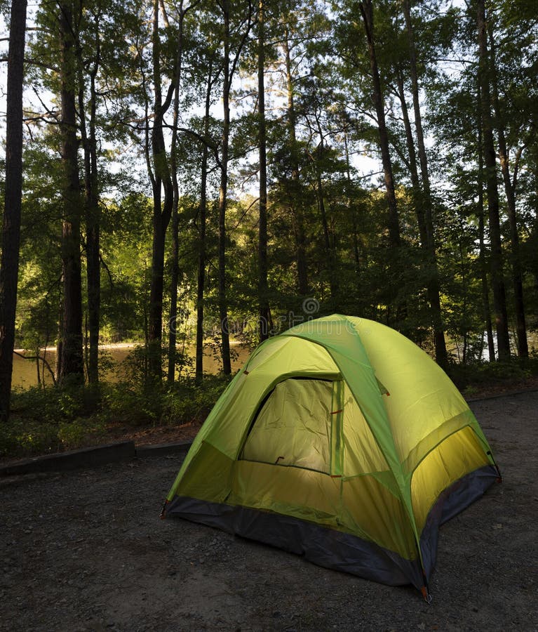Campsite with a small tent stock photo. Image of pitched - 290530662