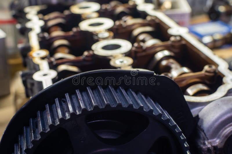 Camshaft Gear of Internal Combustion Engine on Blurred Background of ...