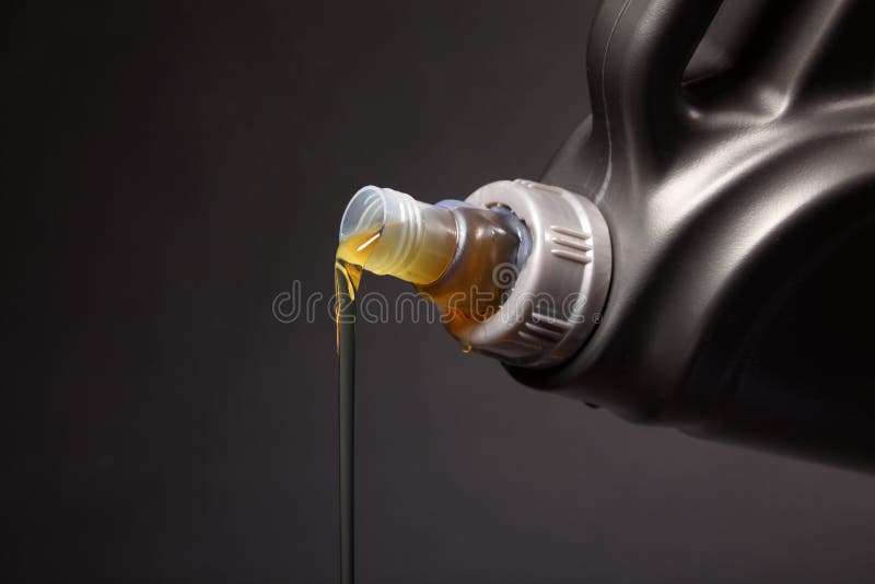 Can with Car Engine Oil Pouring Black Background Stock Photo - Image of ...