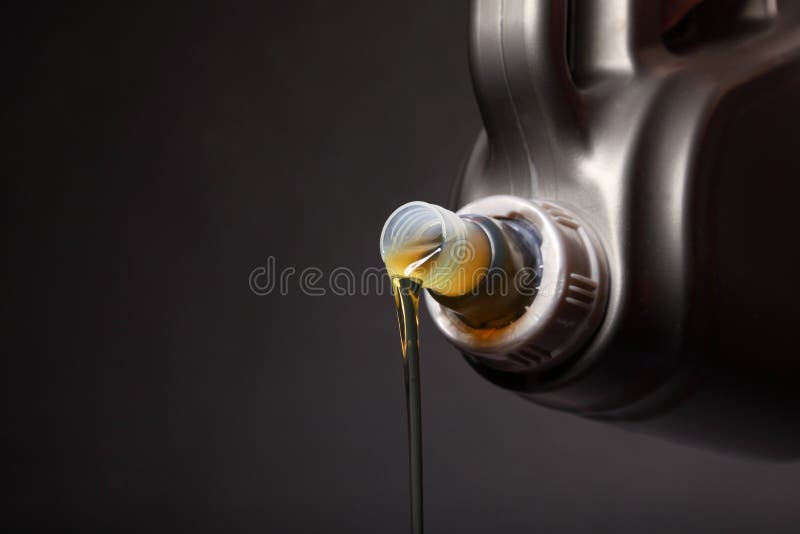 Can with Car Engine Oil Pouring Black Background Stock Image - Image of ...
