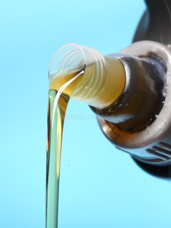 Can with Car Engine Oil Pouring Blue Background Stock Image - Image of ...