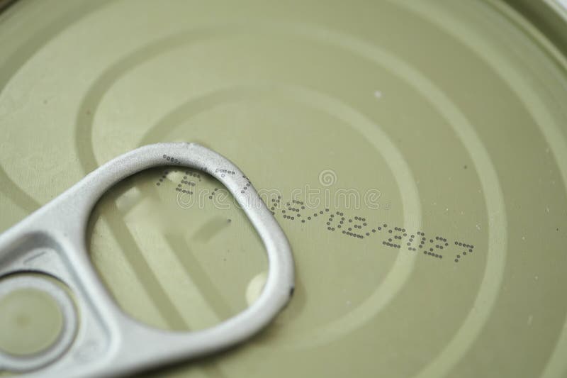 Can Lid with Pull Tab Showing Expiration Date Markings Stock Photo ...
