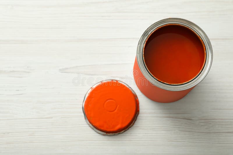 Can of Orange Paint on White Wooden Table, Above View. Space for Text ...