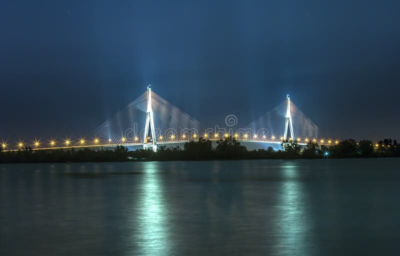 Can Tho Bridge at night stock image. Image of equipment - 53372097