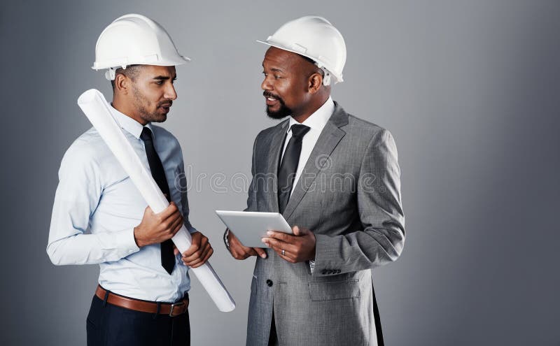 Can You Imagine it. Two Civil Engineers Discussing Building Plans while ...