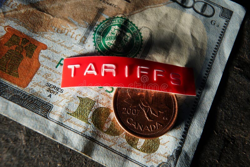 Canada Coin and Tariff Label on a US Hundred Dollar Bill Stock Image ...