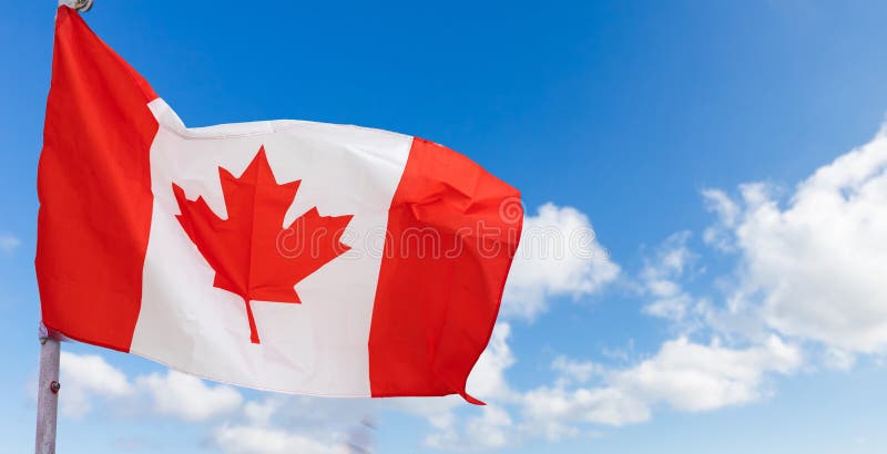 Canada Flag Waving of the Blue Sky. Stock Photo - Image of pole, leaf ...