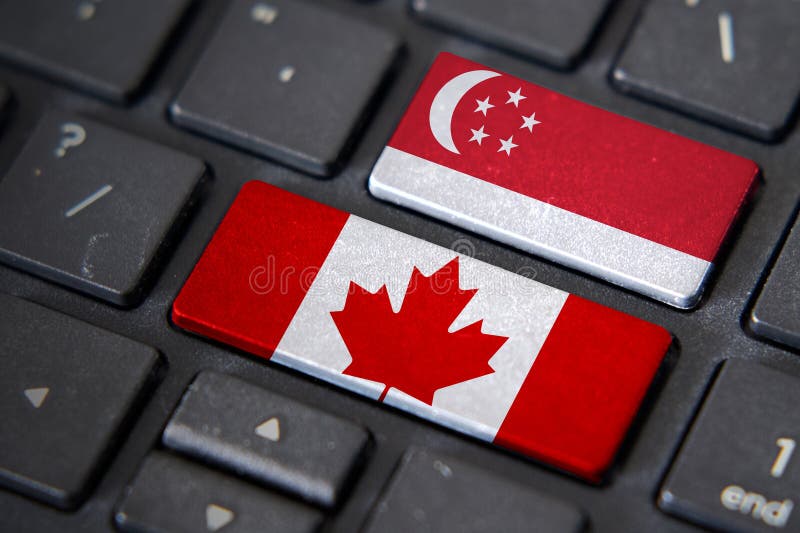 Canada and Singapore Flags on Computer Keyboard Stock Photo - Image of ...