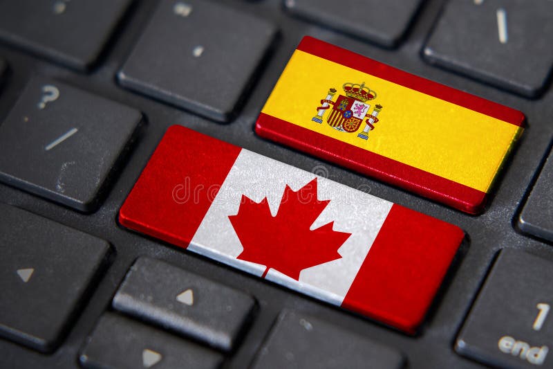 Canada and Spain Flags on Computer Keyboard Stock Image - Image of ...