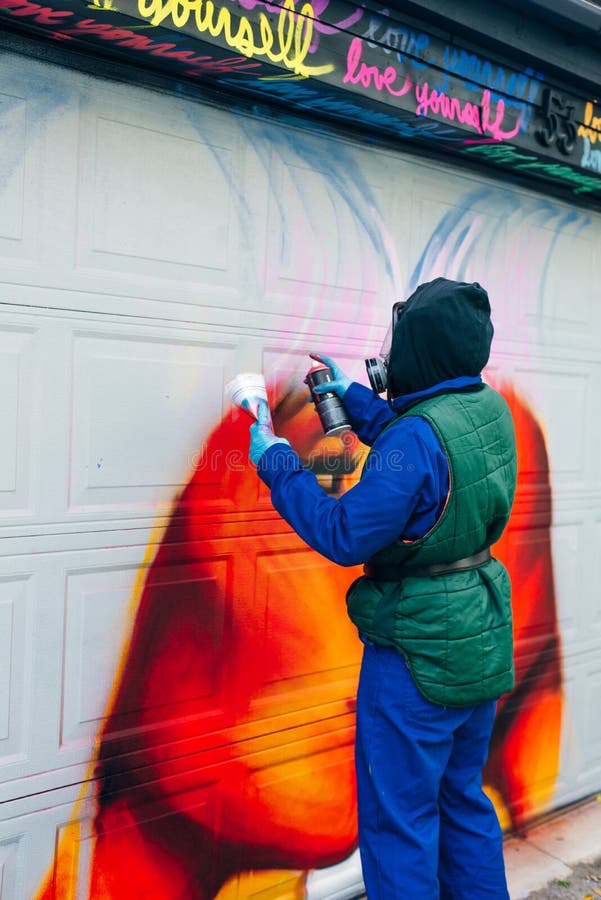 Canada, Toronto - December, 2019 Graffiti Artist Spraying the Wall ...