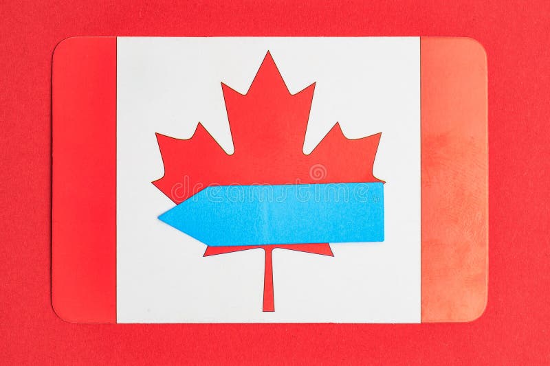 Canadian Flag with Blue Arrow on Red Background Symbolizing Direction ...