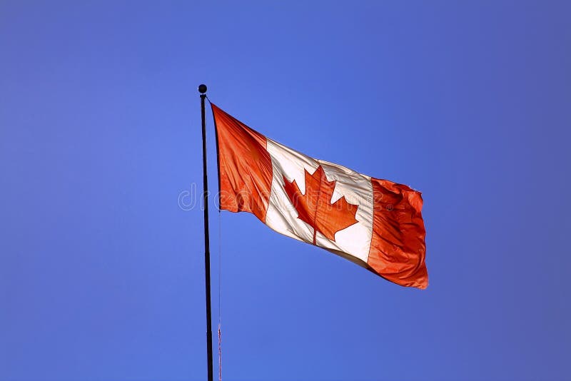 Canadian Flag & Blue Sky Picture. Image: 3747735