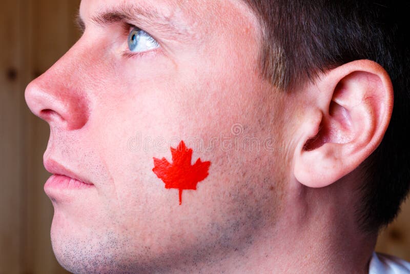 Canadian Flag on the Face of Young Man Stock Image - Image of canadian ...