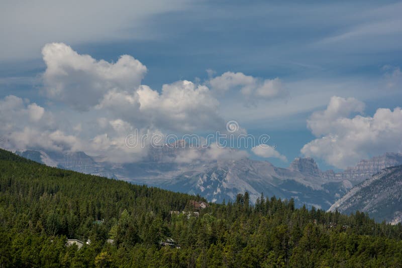 Canadian mountains, clouds stock image. Image of hiking - 103846487